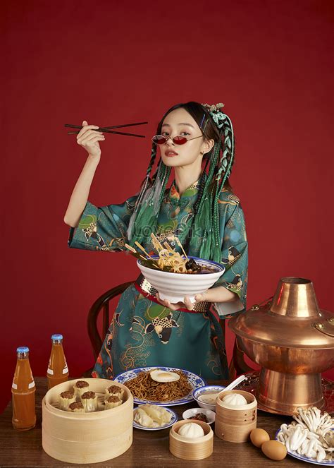 A Beautiful Woman With Glasses And Strings In Her Hand Image And