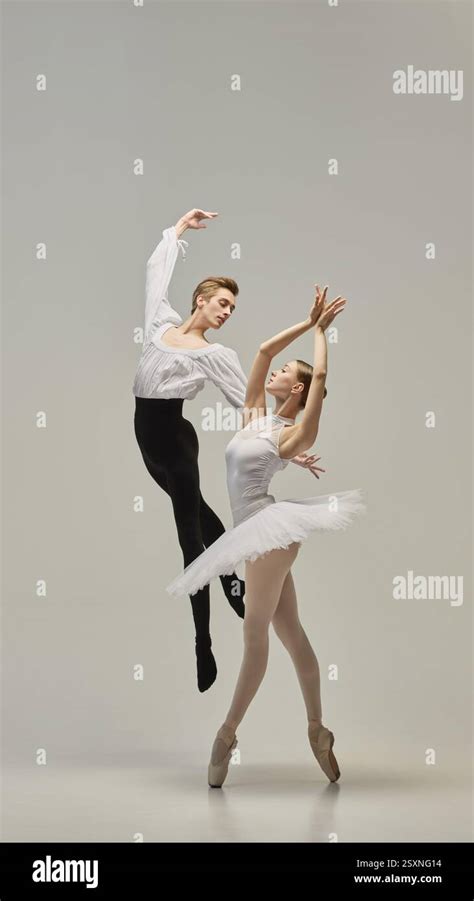 Elegant Ballet Moment Captured Mid Movement Highlighting Form Control