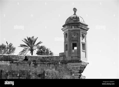 A Black And White Photo Of A Small Building With A Dome On Top The Building Is Surrounded By
