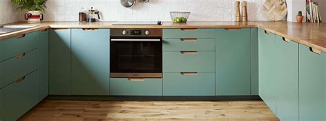 Green Kitchen Cabinets With Butcher Block Countertops