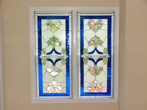 Pair Of Beveled Window Simply Hung With Hooks In Window