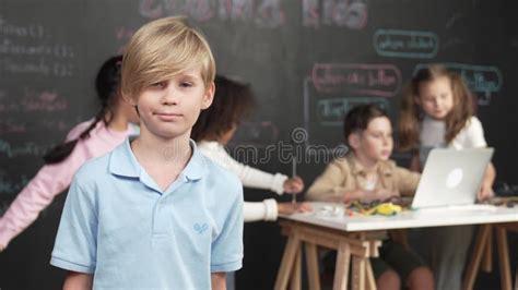 Girl Programming Or Coding System While African Boy Fixing Model