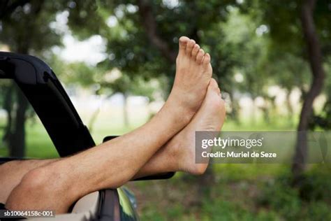 Man Lounging Barefoot Photos And Premium High Res Pictures Getty Images