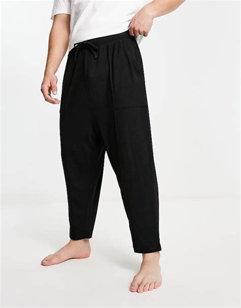 Asos Design Essentialwear Lounge Bottoms In Black Rib With Seam Detail