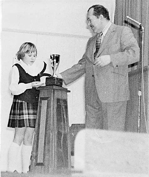 Merylyn Merry Receiving An Award From Raine Leagh For Her Highland