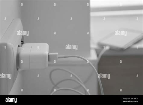 Modern Smartphone Charging From Electric Socket Closeup Stock Photo Alamy