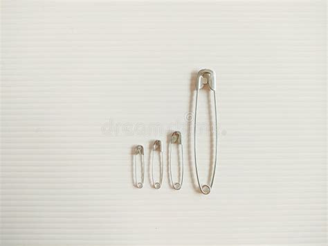 Various Sizes Of Pins From Small To Large Stock Photo Image Of Safety Lighting