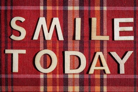 Premium Photo High Angle View Of Smile Today Text On Fabric