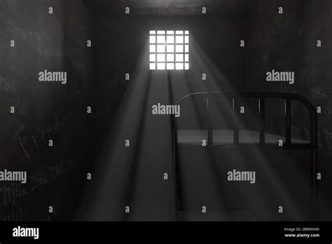 3d Rendering Of Grunge Prison Cell With Bunk Bed And Light Ray Of