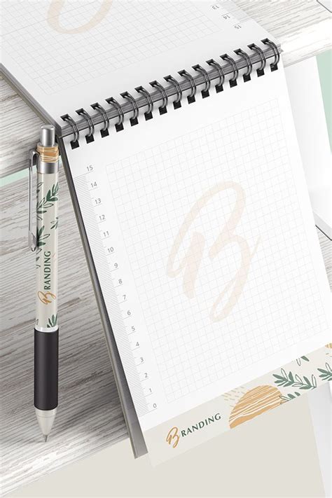 Notebook With Pen Branding Mockup