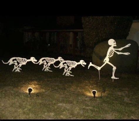 Hollyween Skeletons Running In The Yard At Night Skeleton Halloween