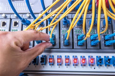 Man Connecting Fiber Network Cables Stock Photo Image Of Center Electronic
