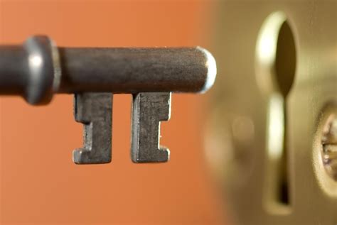 Premium Photo Key And Keyhole