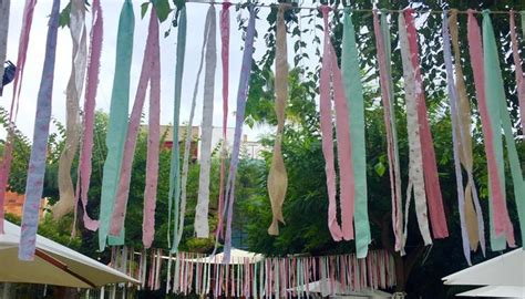 Colorful Streamers Hanging From Trees