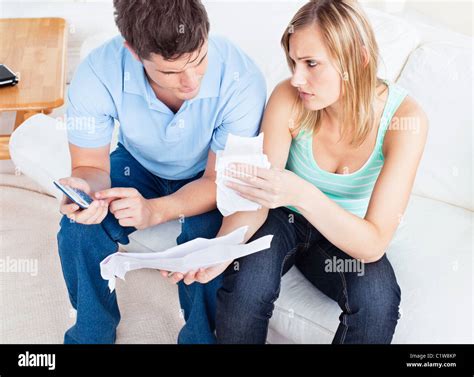 Couple Making Calculation Stock Photo Alamy
