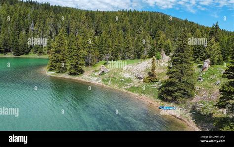 Aerial View Of A Kayak On The Beautiful Teal Blue Waters Of Crystal