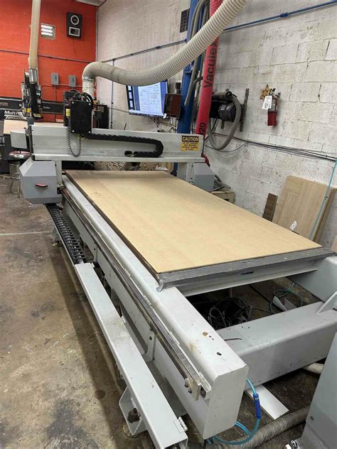 4 X 8 Multicam MG 103 Series CNC Router 2000 Tool Changer Vacuum Pump Revelation Machinery