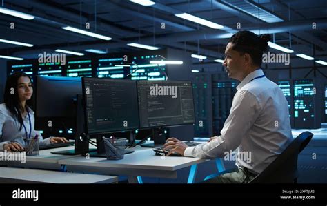 Engineer Overseeing Data Center Making Improvements And Updates To Ensure System Can Handle