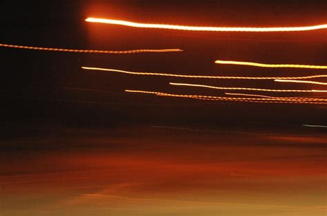 Premium Photo Light Trails Over Road Against Sky At Night