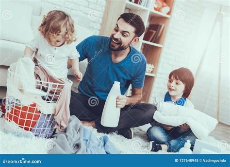 Family Holidays Father Two Boys Dirty Laundry Stock Image Image Of Flat Clothes