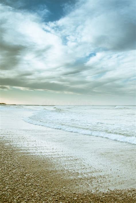 Beach Photography Blue Ocean Waves Sand Overcast Sky Stock Image
