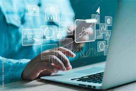 Businessman Works On Laptop Showing Business Analytics Dashboard With Charts Metrics And Kpi