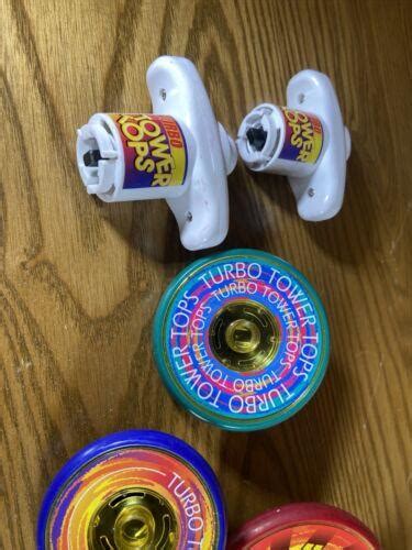 Vintage Turbo Tower Totem Top Spinning 10 Tops And 2 Launchers 3833975546