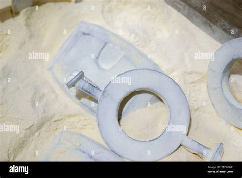 Objects Printed On A 3d Printer From Powdered Polyamide Lying In White Polyamide Powder Models