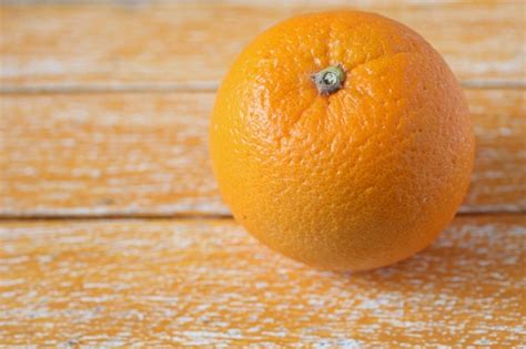 Premium Photo Close Up Of Orange Fruit