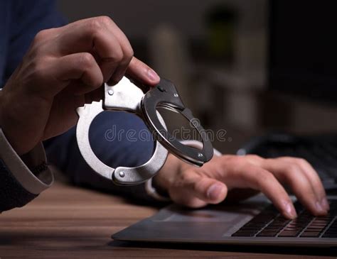 Male Hacker Hacking Security Firewall Late In Office Stock Image