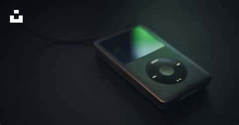 A Close Up Of An Ipod On A Table Photo Free Ipod Image On Unsplash