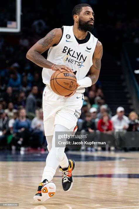 Kyrie Irving Of The Brooklyn Nets Brings The Ball Up Court Against