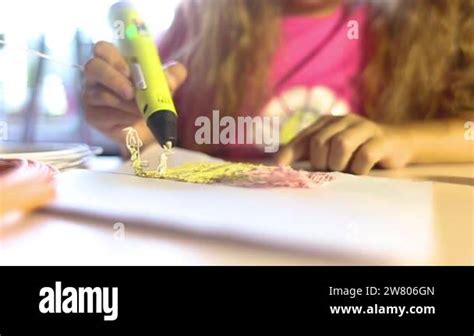 The Girl Creates Objects With A 3d Pen Modern Hobby Creation Of 3d