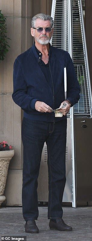 Pierce Brosnan 65 Continues To Rock His Natural Locks During Stroll