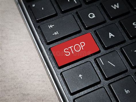 Close Up Of A Red Button With Stop Word On The Keyboard Stock Image