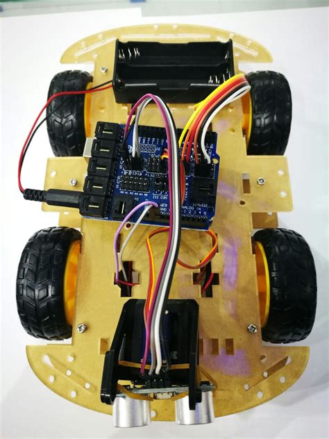 Intelligent Bluetooth Tracking Obstacle Avoidance Car Assembled