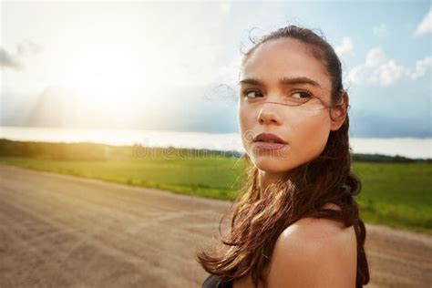 Fit Is The New Sexy A Fit Young Woman Getting Some Exercise Outside On