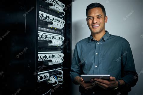 premium photo engineer man tablet and portrait in server room with