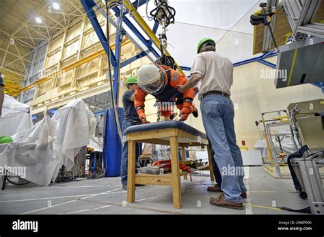 Astronaut Rex Walheim Uses The Active Response Gravity Offload System Argos To Perform Early