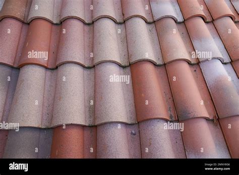Red Roof Tiles Ceramic Shingles On House Building As Background Stock