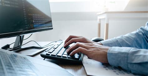 Programmer Working On Computer In It Office Typing Data Coding I Irf