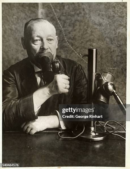 An Interpreter Speaking Through The New Device Introduced At The News Photo Getty Images