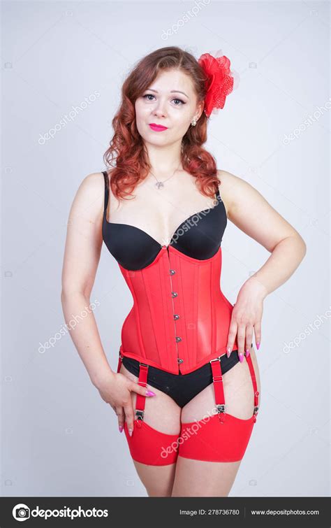 Cute Caucasian Curvy Girl Red Corset Black Lingerie White Background