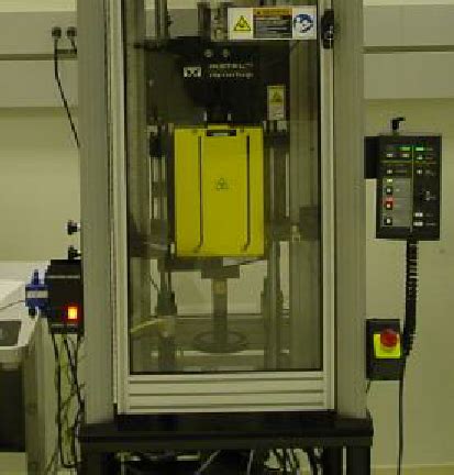 Head Of The INSTRON Impact Testing Machine With Added Weight Compartment Download Scientific