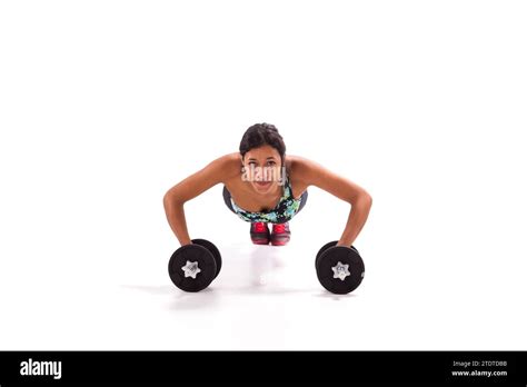 Woman Exercising Making Push Ups With Dumbbels Isolated On White Stock Photo Alamy