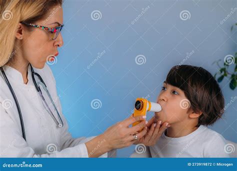 Pulmonologist Measuring Lung Capacity And Force Expiratory Volume To A