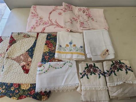 Assorted Pillowcases Some With Needlework Northern Kentucky Auction