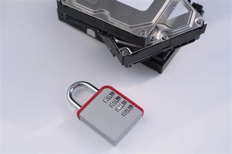 Premium Photo Encrypted Hard Disk Padlock With Cipher On An Opened Hard Disk Data Loss