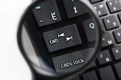 Premium Photo Magnifying Glass On Black Keyboard