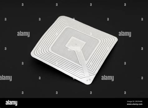 rfid tag isolated on black background radio frequency identification